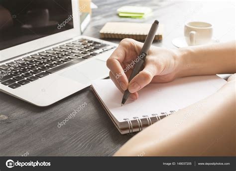 Lady Writing In Notepad Stock Photo By Peshkova 148037205