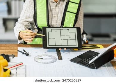 Female Architect Engineer Drafting Blueprints Using Stock Photo Shutterstock