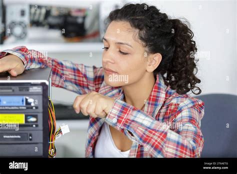 A Woman Installation Of Pc Stock Photo Alamy