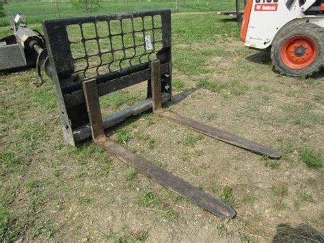 BOBCAT FORK ATTACHMENT GOOD CONDITION READY TO USE McPherson Auction Realty