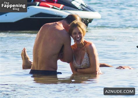 Sydney Sweeney Sexy Seen With Glen Powell Swim Out To A Yacht While Filming Aznude