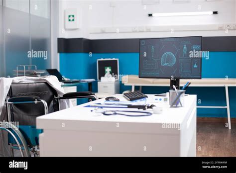 Unoccupied Healthcare Office With Desktop Monitor Displaying Brain And Body Scan Data For