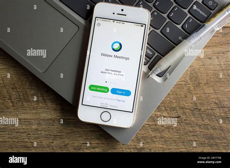 Cisco Webex Meetings Mobile App Login Page Is Seen On A Smartphone The