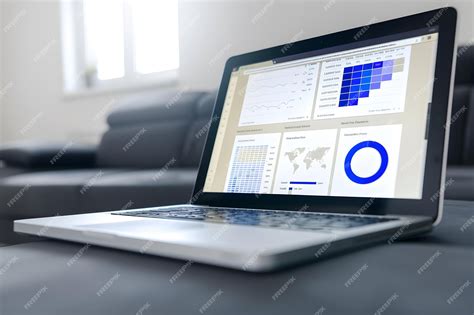 Modern Laptop Displaying Data Analytics And Visualizations In A Cozy