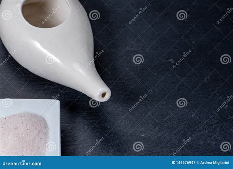 Set For Nasal Cleaning With Neti Pot Ayurvedic Medicine System On A Black Slate Top View Stock