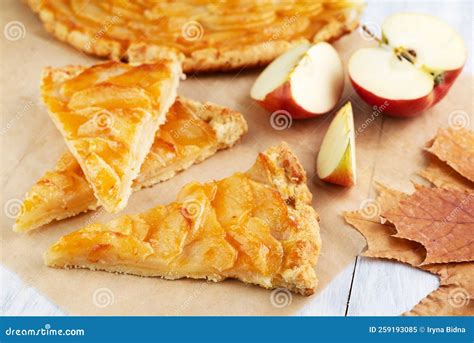 Slices Of Apple Pie Apples Autumn Leaves On A Light Table Stock Image Image Of Apple