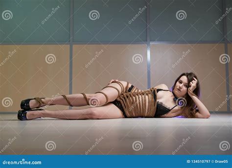 Woman Bound With A Rope In Japanese Technique Shibari Stock Image