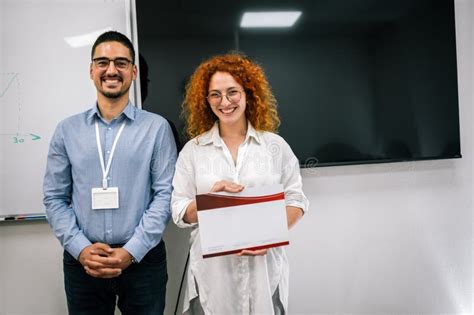 Teachers Teaching Young Students A Programming Class In The Classroom