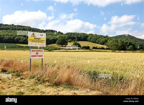 Warning Sign In A Field Saying MOD Property No Admittance And Danger Long Term Pest And Vermin