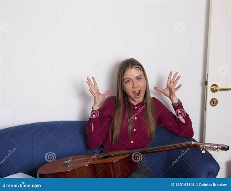 The Girl In A Red Shirt Spread Her Fingers Scream From Nervousness Stock Image Image Of