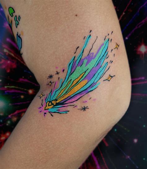 Vibrant Shooting Star Tattoo With Color Meaning And Design Inspiration