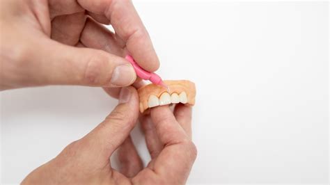 How To Clean Under A Bridge With Floss Or Interdental Brushes Amelo