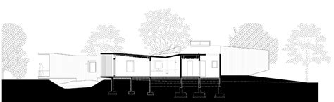 Concrete House By Architecture Brio That Bridges A Stream In India