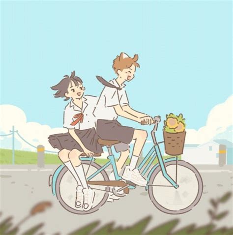 A Man And Woman Riding On The Back Of A Bike