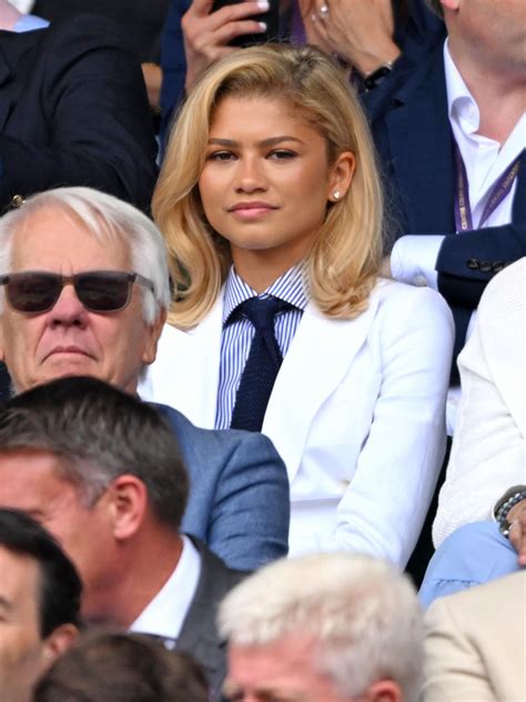 Zendaya Suits Up In White Ralph Lauren Blazer Striped Shirt And Tie