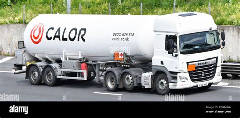 Side And Front View White Daf Cf Prime Mover Hgv Lorry Truck Driver And Calor Gas Articulated