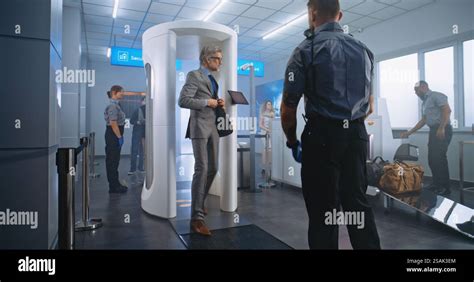 Airport Terminal Checkpoint Diverse People Walking Through Metal