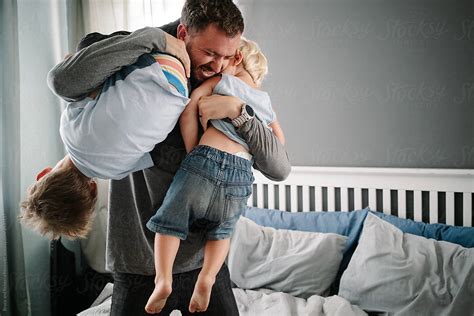 Dad And Sons Playing By Stocksy Contributor Bruce And Rebecca
