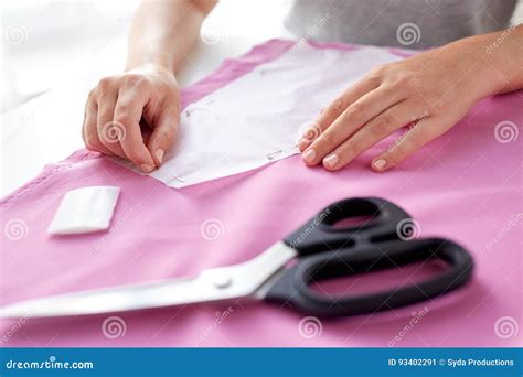 Woman With Pins Stitching Paper Pattern To Fabric Stock Image Image