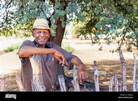 African Village Happy Single Old Man With Toothy Smile Behind The
