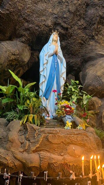 Premium Photo Holy Virgin Mary In Roman Catholic Church In The Cave Of Virgin Mary In A Rock
