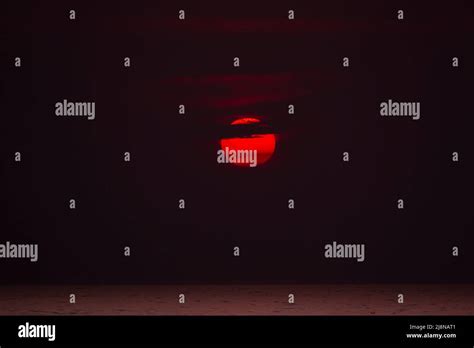 Romantic Blood Red Sunset With Reflection On The Sea Stock Photo Alamy