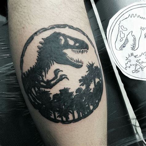 Jurassic Park Tattoo Done By Jeremy Lewis At Sickle And Moon Tattoo