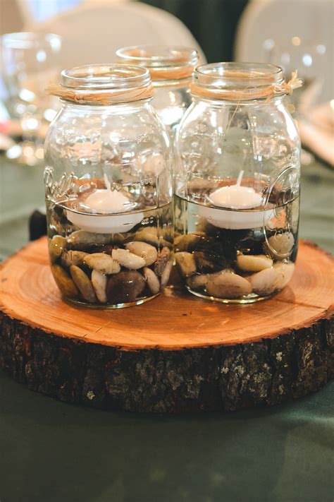 Mason Jars With Floating Candles Centerpieces At Sherry Powers Blog