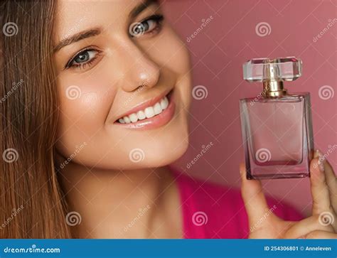 Perfume Beauty Product And Cosmetics Model Face Portrait On Pink