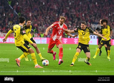 From Left Ramy Bensebaini Borussia Dortmund Harry Kane Fc Bayern