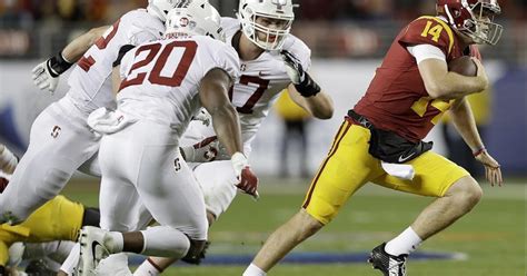 Usc Claims Pac 12 Title With 31 28 Defeat Of Stanford Los Angeles Times
