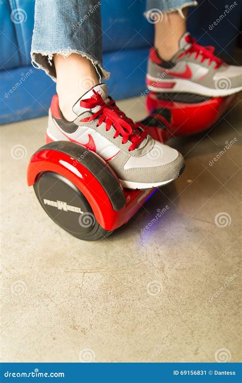 Girl Using A Red Self Balancing Two Wheeled Board The Gyroscope Based Dual Wheel Electric S