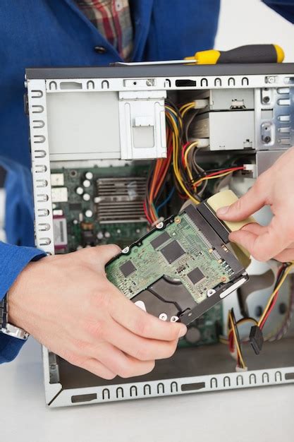 Premium Photo Computer Engineer Working On Broken Cpu