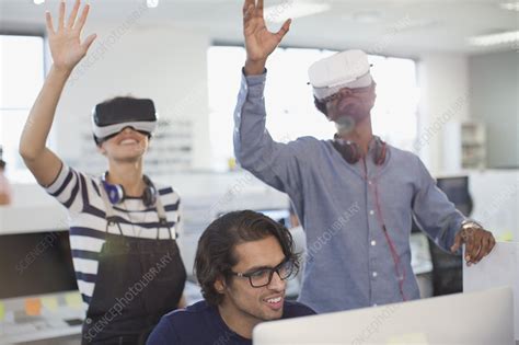 Computer Programmers Testing VR Simulators Stock Image F021 5642