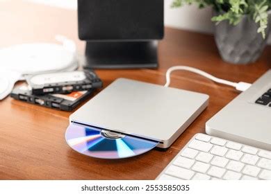 Man Inserting Dvd External Dvd Drive Stock Photo 2553585033 Shutterstock