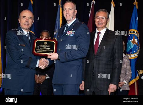 Us Air Force Lt Col Thomas Naughton Is Presented With The Amsus