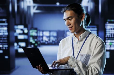 Worker Prevents Server System Overload Stock Image Image Of Laptop