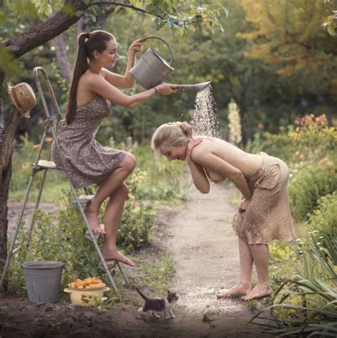 Helping Her Bathe Adm2720