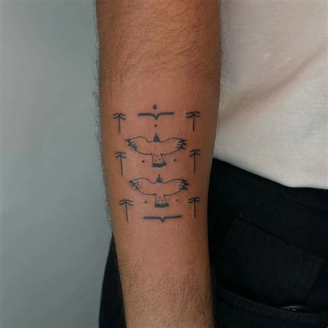 60 Meaningful Symbol Tattoos To Inspire Your Next Ink