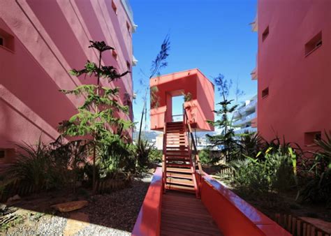 Pink Walls Frame Rooftop Garden Of Housing By Pietri Architectes