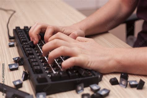 Man Breaks A Mechanical Computer Keyboard By Typing Angrily Stock Photo Adobe Stock