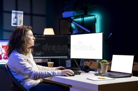 Programmer Installing Fortified Code On Mockup Pc And Laptop Stock
