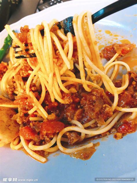 肉酱意大利面特写摄影图 西餐美食 餐饮美食 摄影图库 昵图网nipic