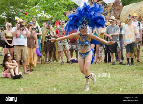 A Dancer Dressed In A Fanciful Costume Delights Onlookers At The Oregon