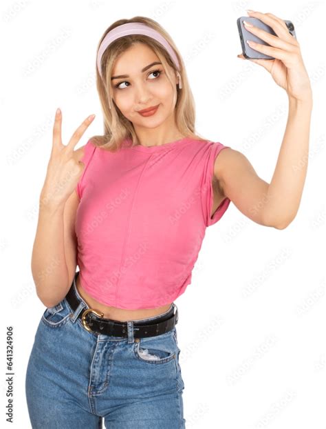 Taking Selfie Portrait Of Young Caucasian Blonde Teenage Girl Taking