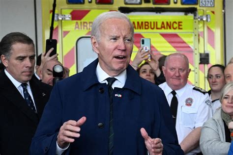 Viral Video Of Joe Biden Scratching Neck Sparks Wild Conspiracy Theory