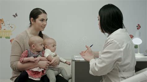 Cute Newborn Twins Being Examine By Pediatrician Stock Video Video Of Examination Healthcare
