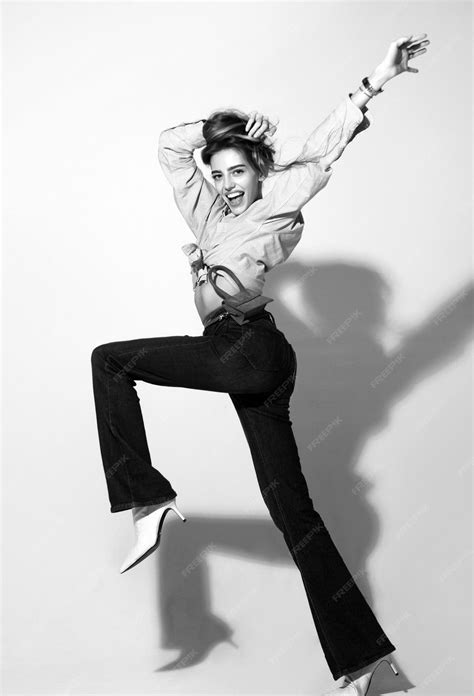 Premium Photo Fashion Woman In Pink Shirt And Jeans Movement Model
