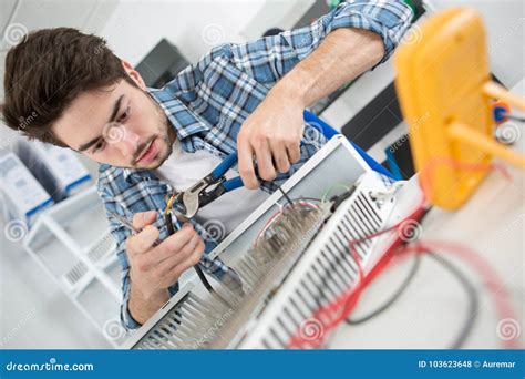 Man Holding Tools While Fixing Device Stock Photo Image Of Circuitry Hand 103623648