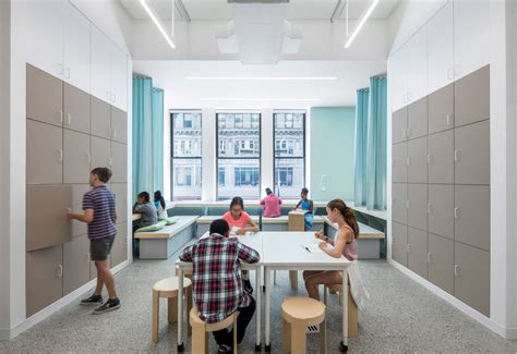 Ai Designs New York City School With Colourful Panels And Tiered Seating